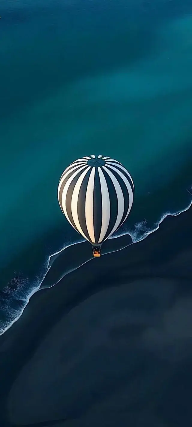 Striped Hot Air Balloon Flying Over The Ocean Best iPhone Wallpapers ...